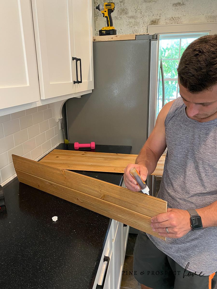 Hide Your Refrigerator With This Easy and Charming DIY Panelling Hack ...